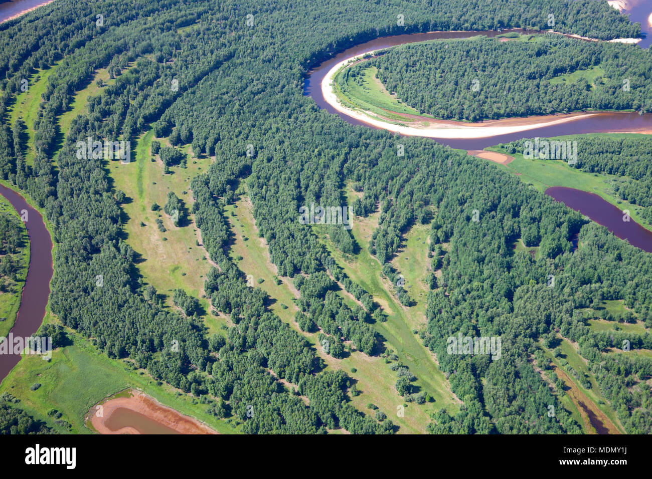 Flight over forest blue lake hi-res stock photography and images - Alamy