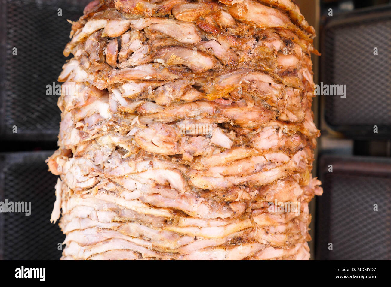 Large Gyros skewer spinning in a local restaurant Stock Photo - Alamy