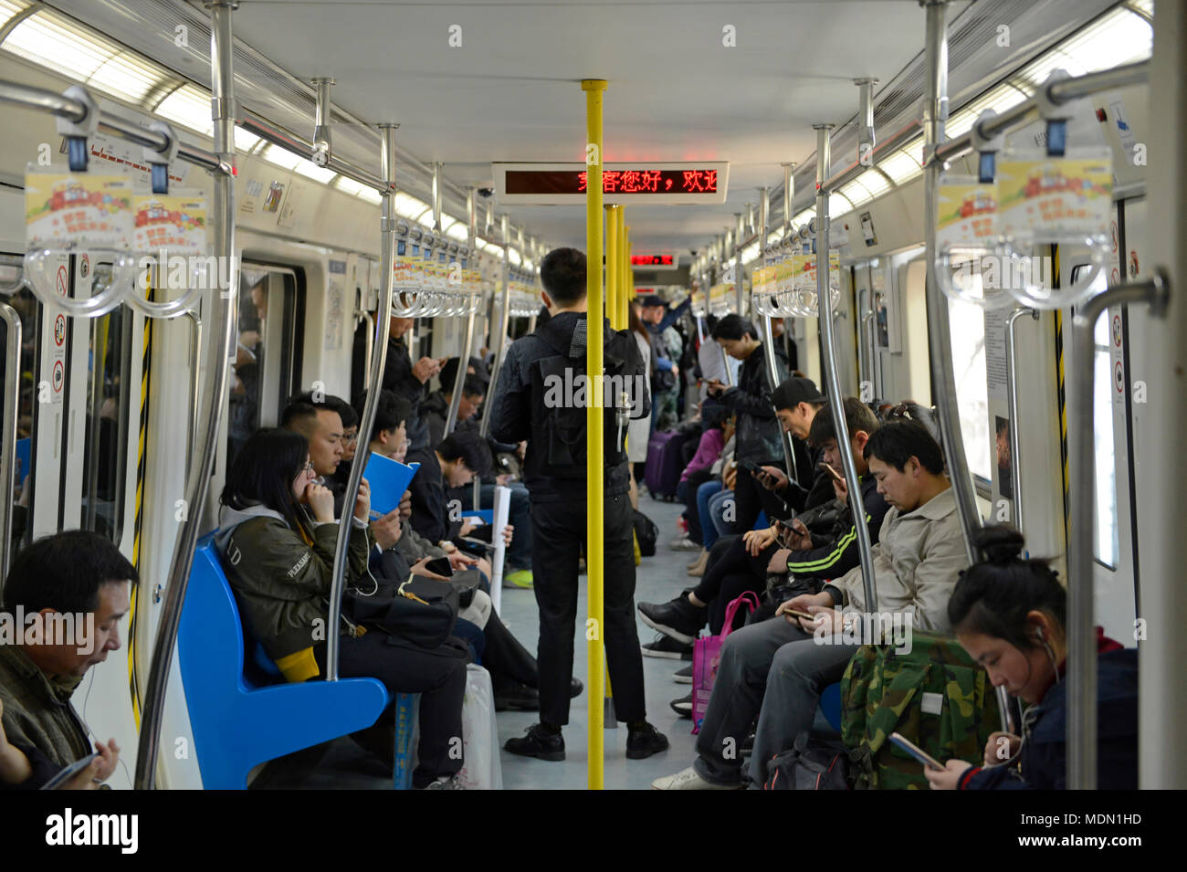 Passengers on a line 1 metro train in Beijing, China Stock Photo - Alamy