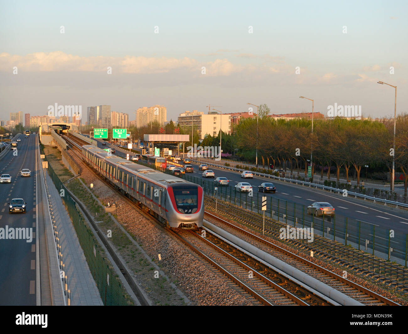 Train on Beijing metro line 1 near Communications University station ...