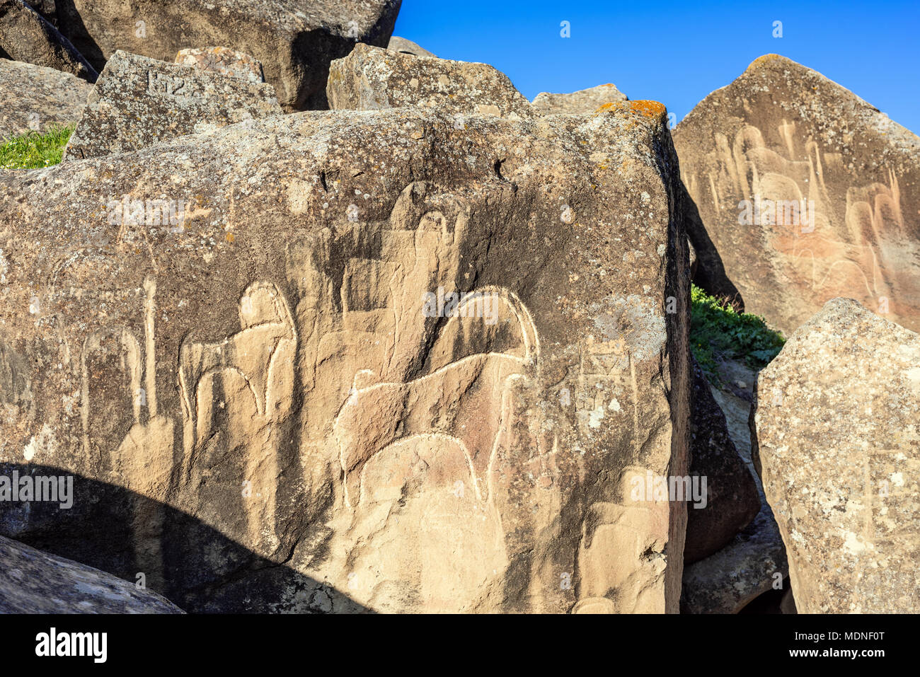 Fragments of rocks with ancient drawings Stock Photo - Alamy