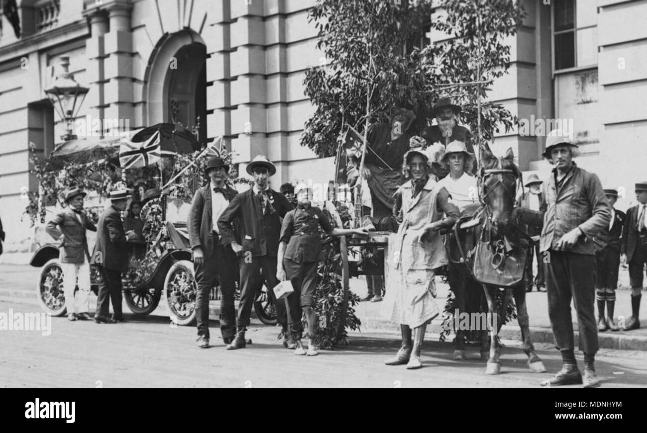 Parade members posing with their floats on Peace Celebration Day Stock ...