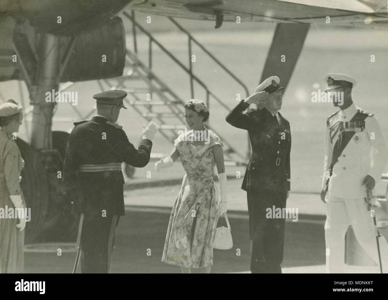 Queen Elizabeth II accompanied by the Governor, Sir John Lavarack Stock ...