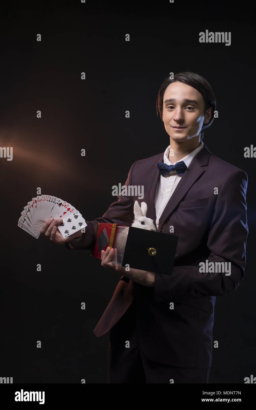Man showing tricks with cards hi-res stock photography and images - Alamy