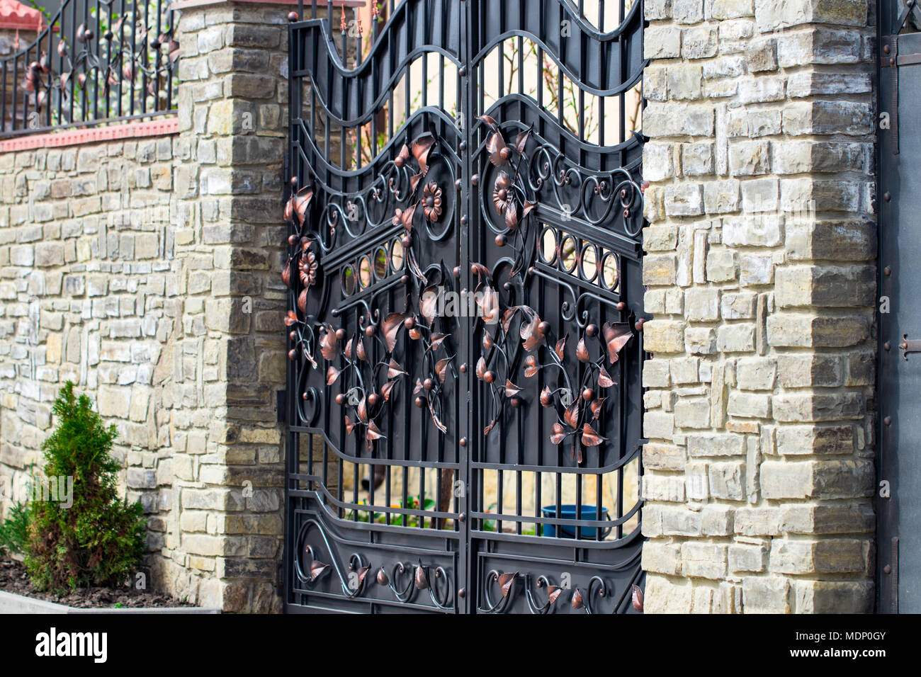 wrought-iron gates, ornamental forging, forged elements close-up Stock ...