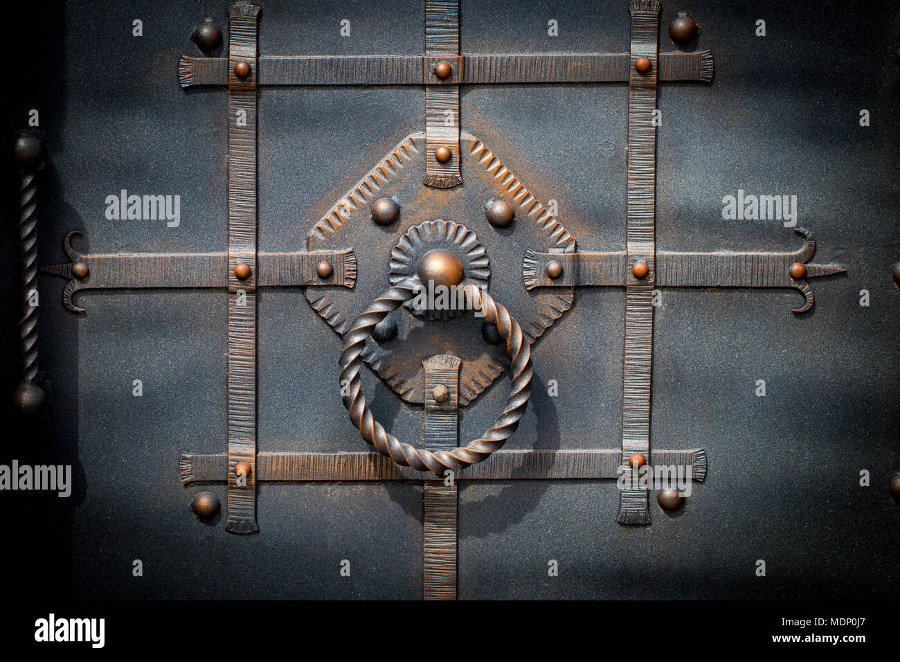 door decoration with ornate wrought-iron elements, close up Stock Photo ...