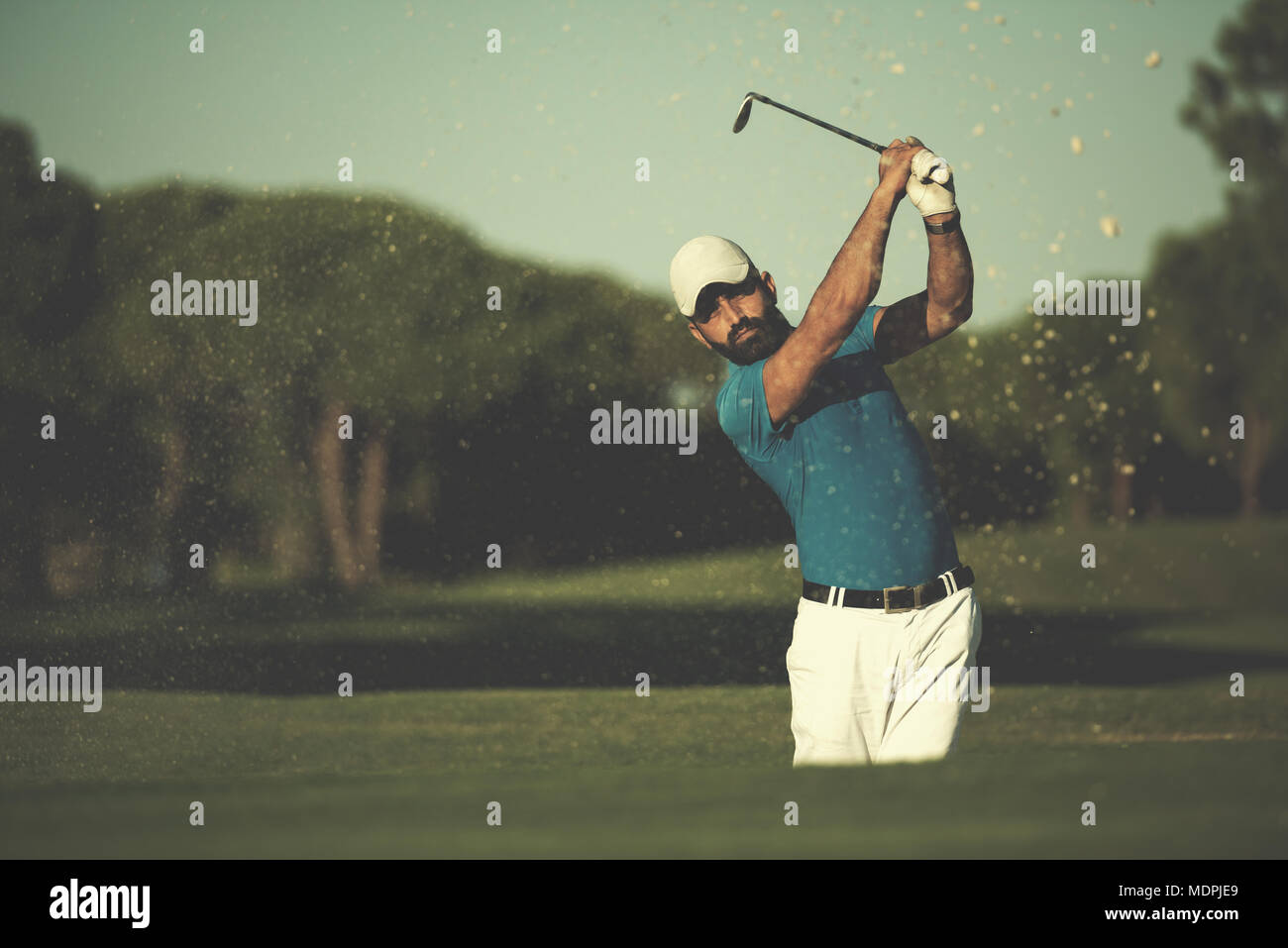 pro golf player shot ball from sand bunker at course Stock Photo - Alamy