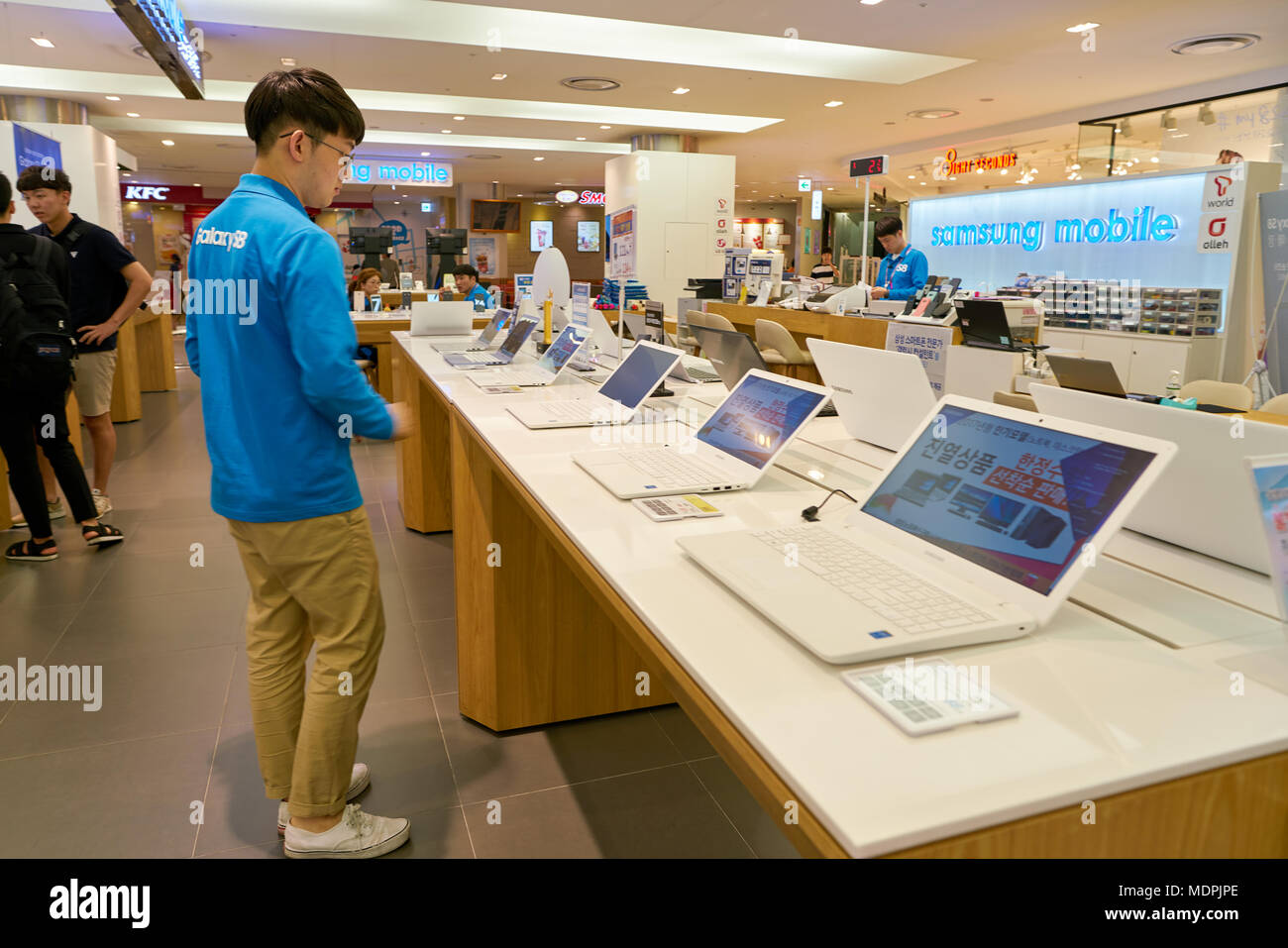 BUSAN, SOUTH KOREA - MAY 28, 2017: Samsung laptops on display at Lotte ...