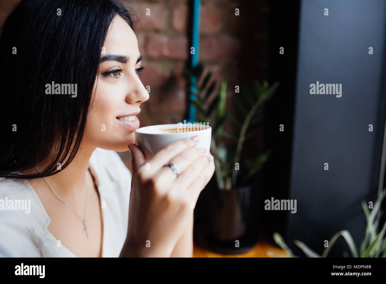 Coffee. Beautiful Girl Drinking Tea or Coffee in Cafe. Beauty Model ...