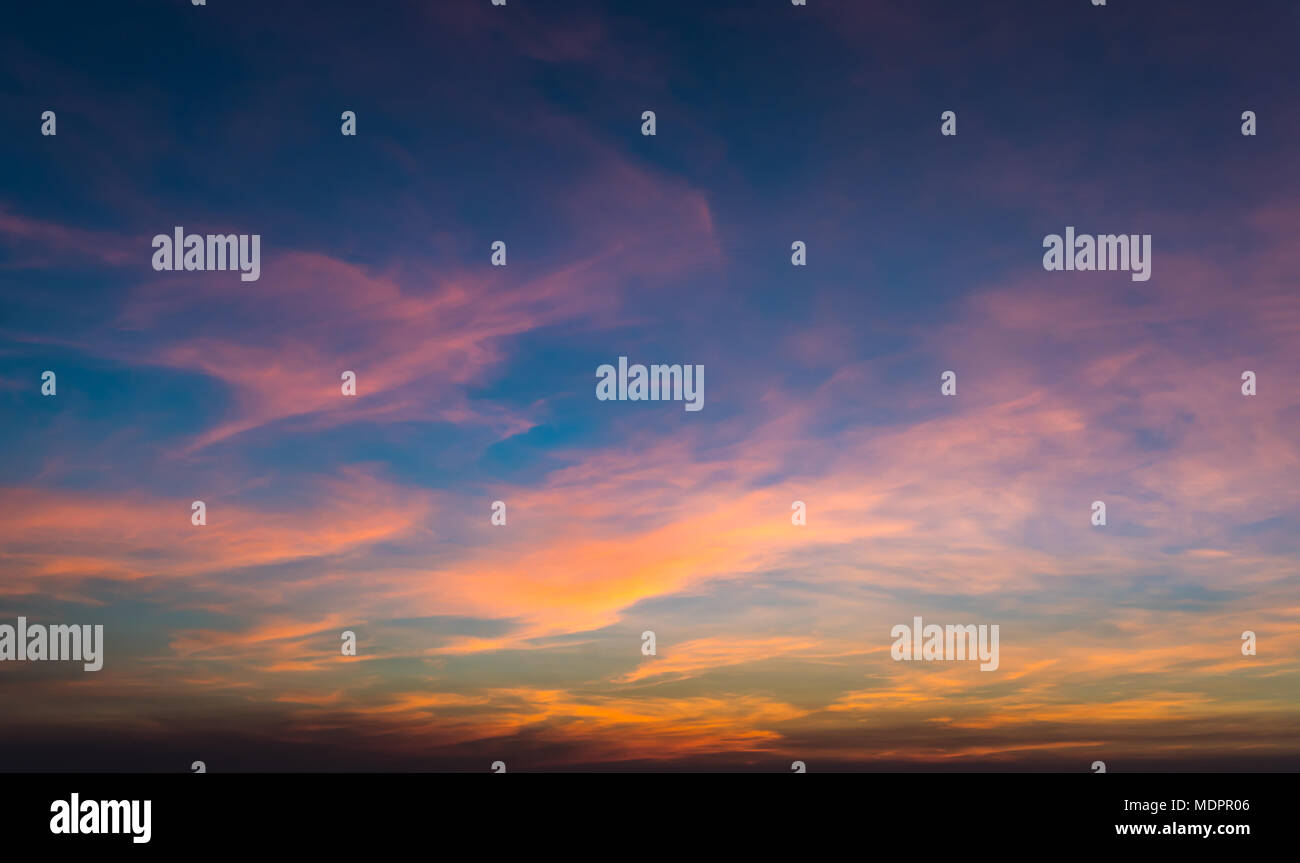 twilight colorful sky and cloud with sunlight shine behind background ...