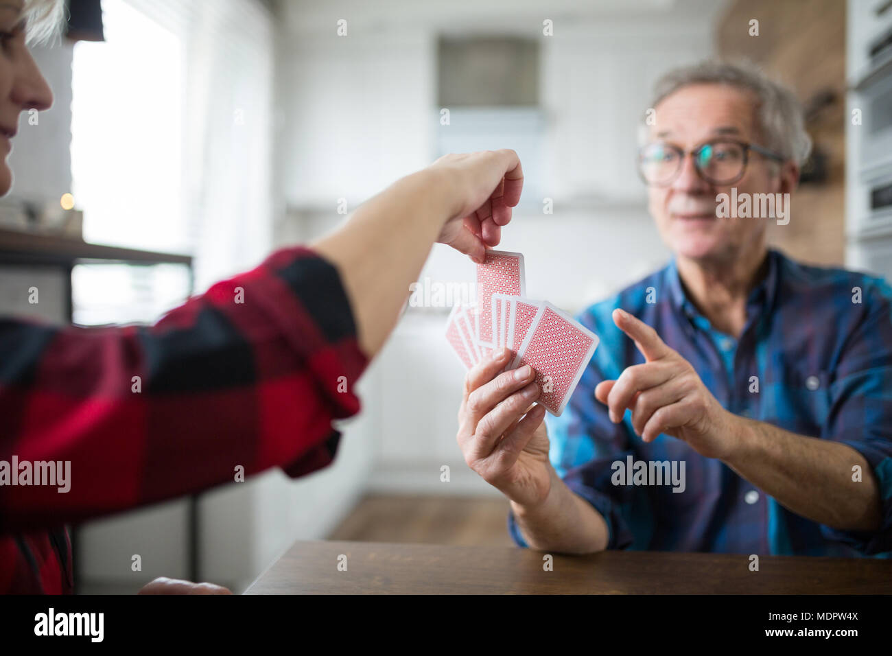 Husband wife playing cards hi-res stock photography and images - Alamy
