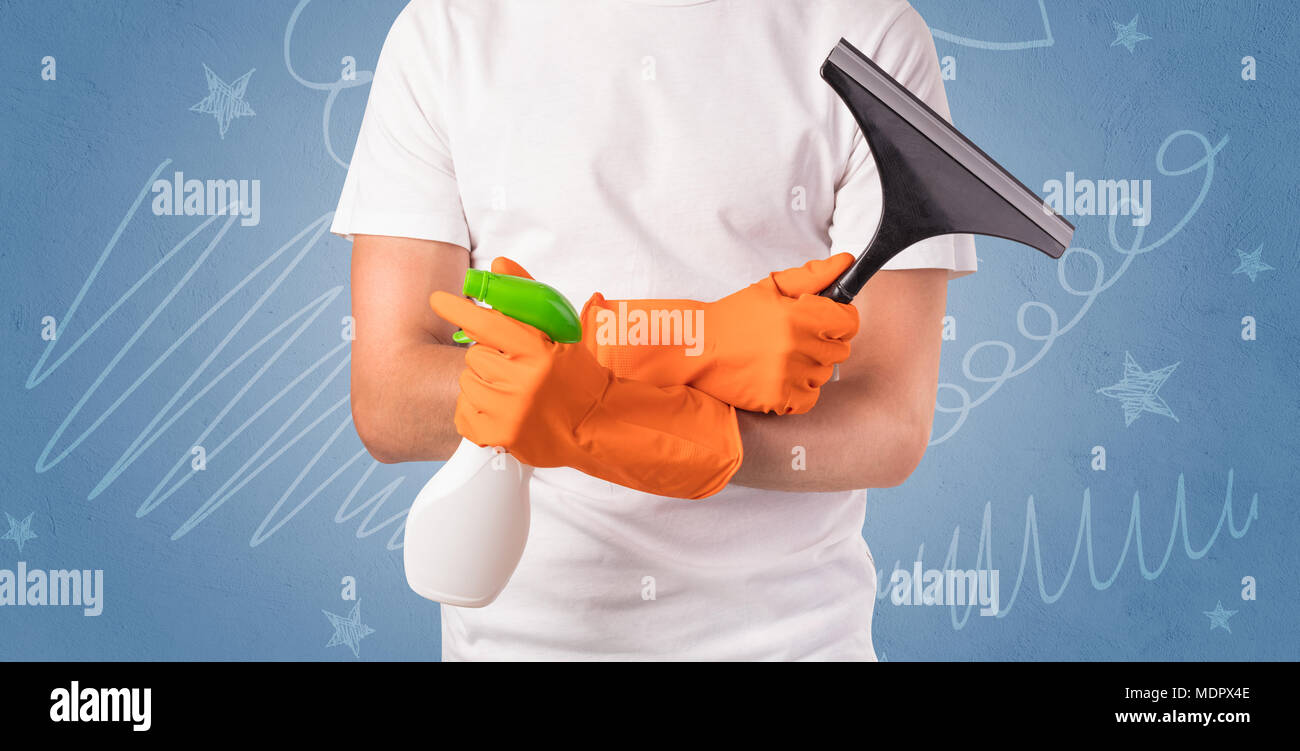 Swabber with orange rubber gloves and doodle concept on wallpaper Stock ...