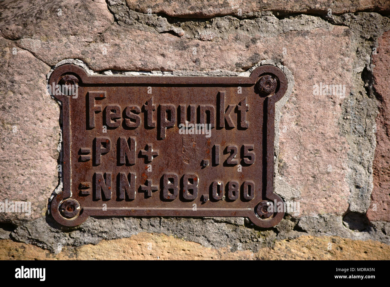A benchmark or surveying point for landscape surveying in geodesy Stock ...