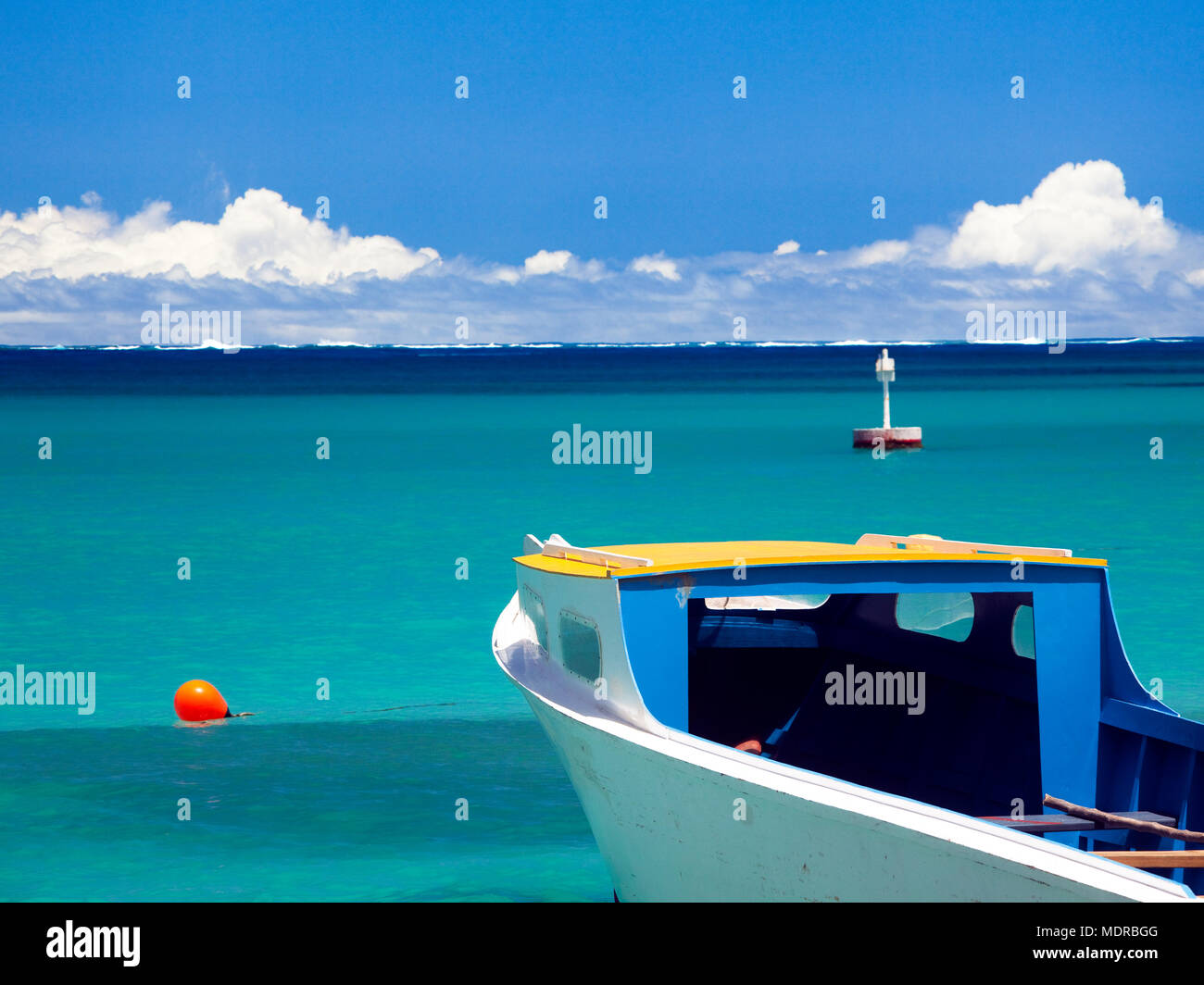 Tropical seascape with fishing boats Stock Photo - Alamy