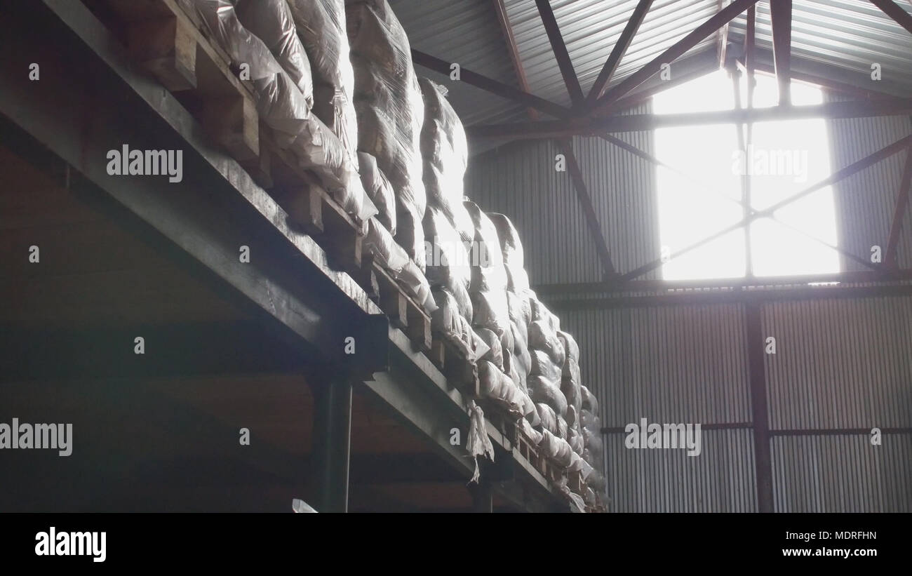 Shelves of cardboard boxes inside a storage food warehouse Stock Photo ...