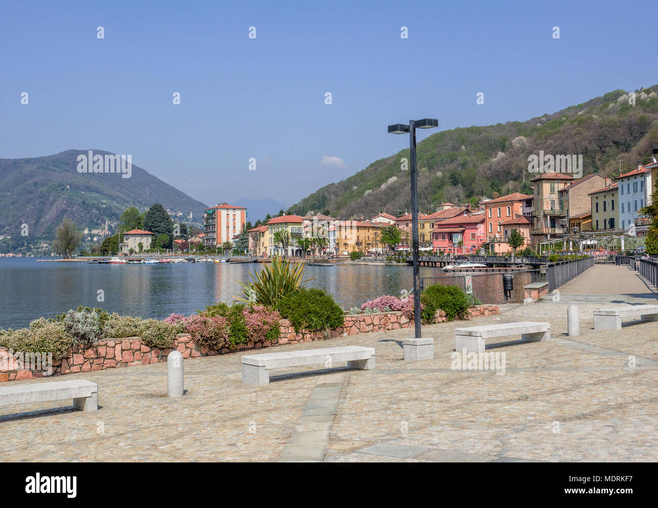 colorful village on Lake Lugano on a bright summer day. Italy Stock ...