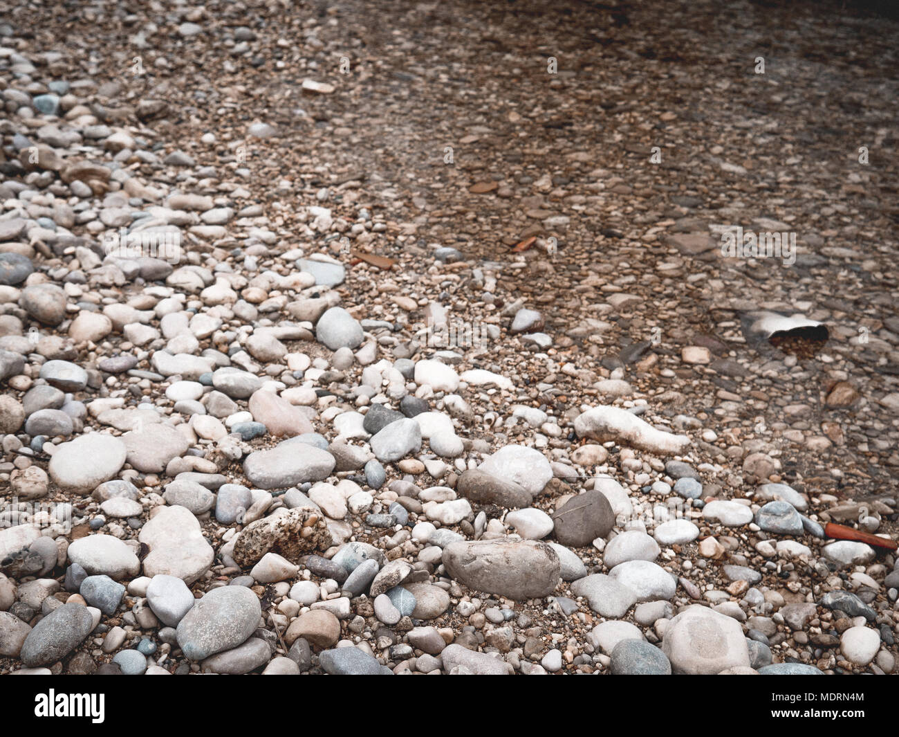 river pebbles texture background Stock Photo - Alamy