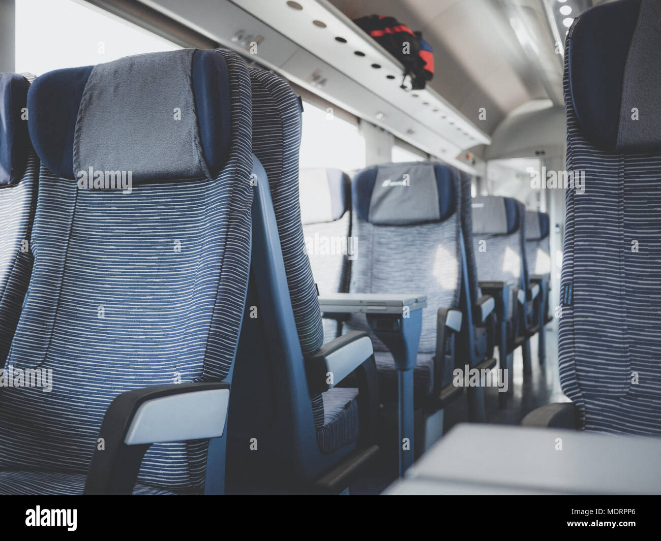 blue empty interior compartment of train high speed italian Stock Photo ...