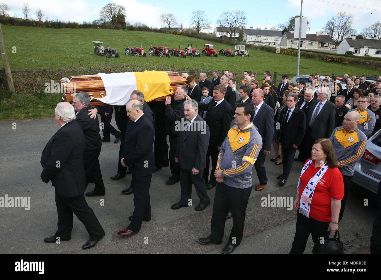 The funeral cortege makes it way to Saint Patrick's Church in Oram ...