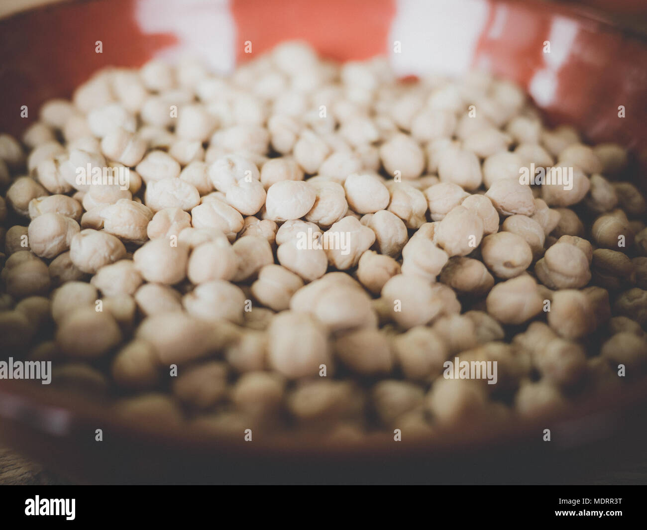 red dish full of chickpeas, view fro above Stock Photo - Alamy
