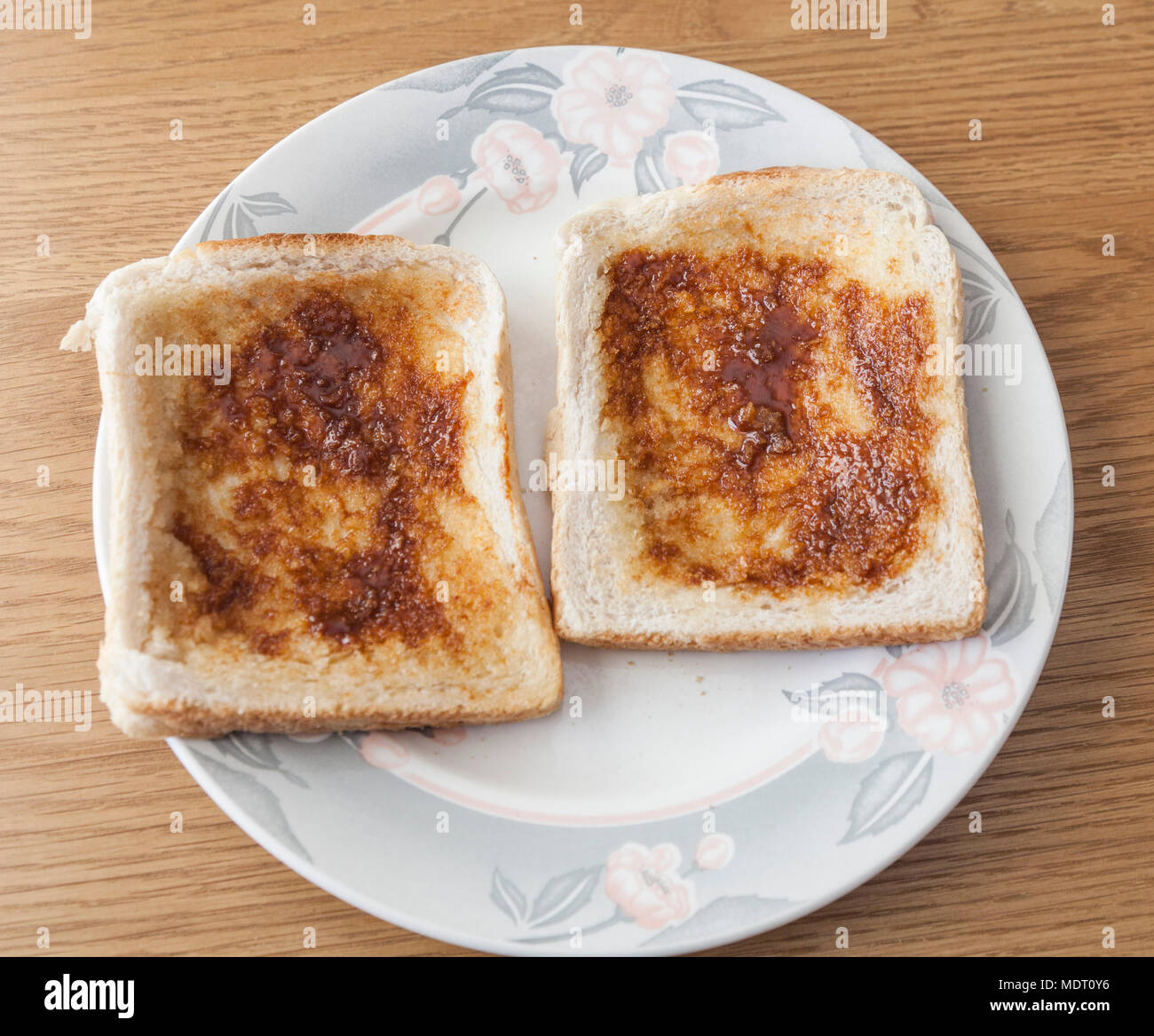 Marmite on toast on a plate Stock Photo - Alamy