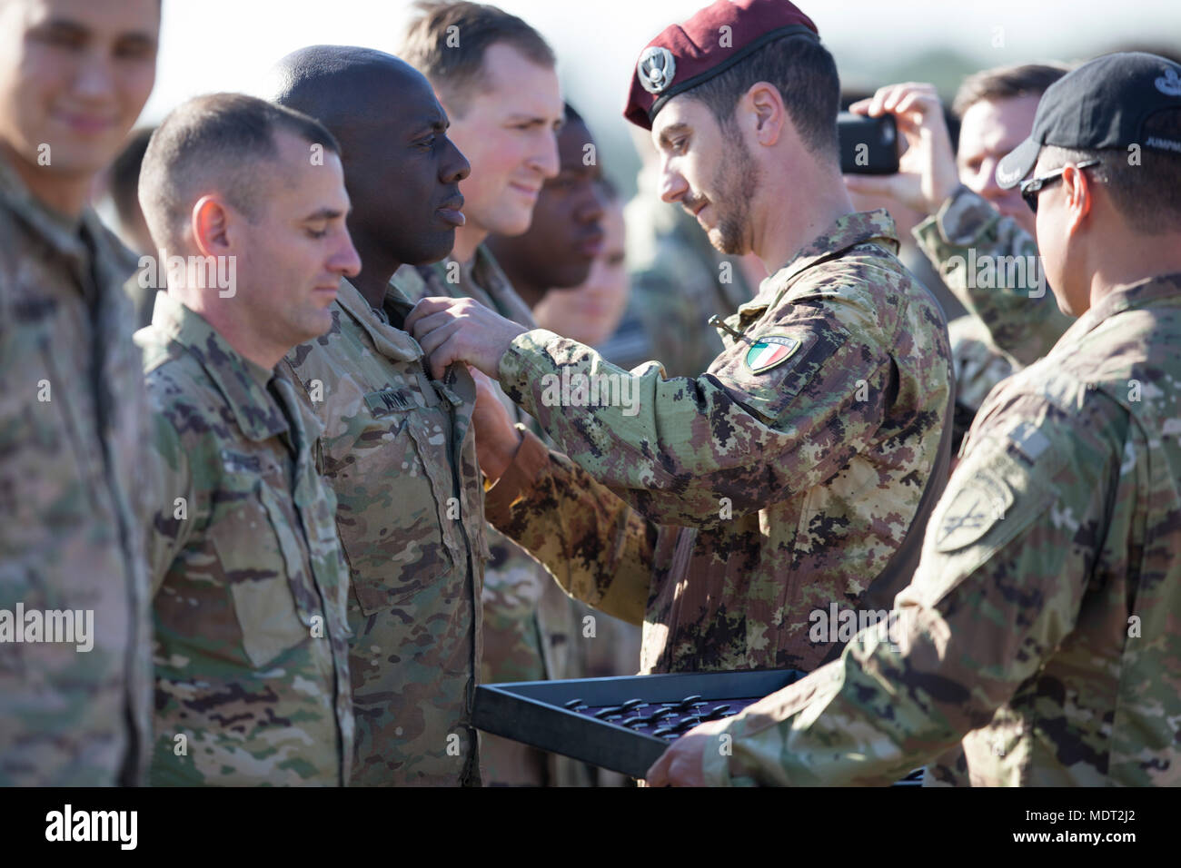 U.S Army paratroopers receives their foreign jump wings from an Italian ...