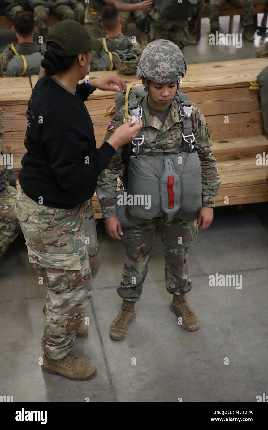 U.S. Army Staff Sgt. Nikita Revilloza assigned to the 112th Signal ...