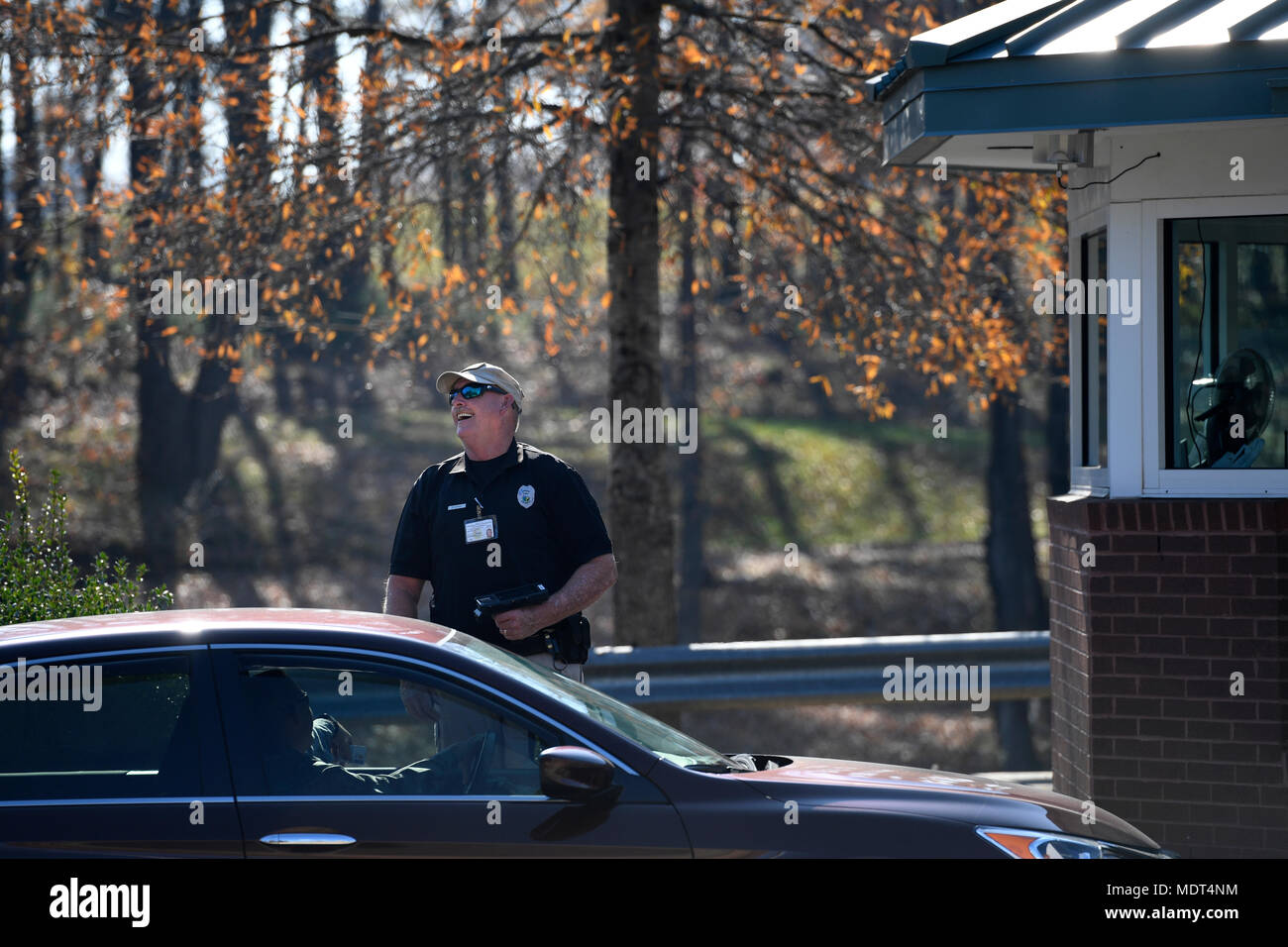 Officer Bobby Gallman, P & G Security Services, check identification ...