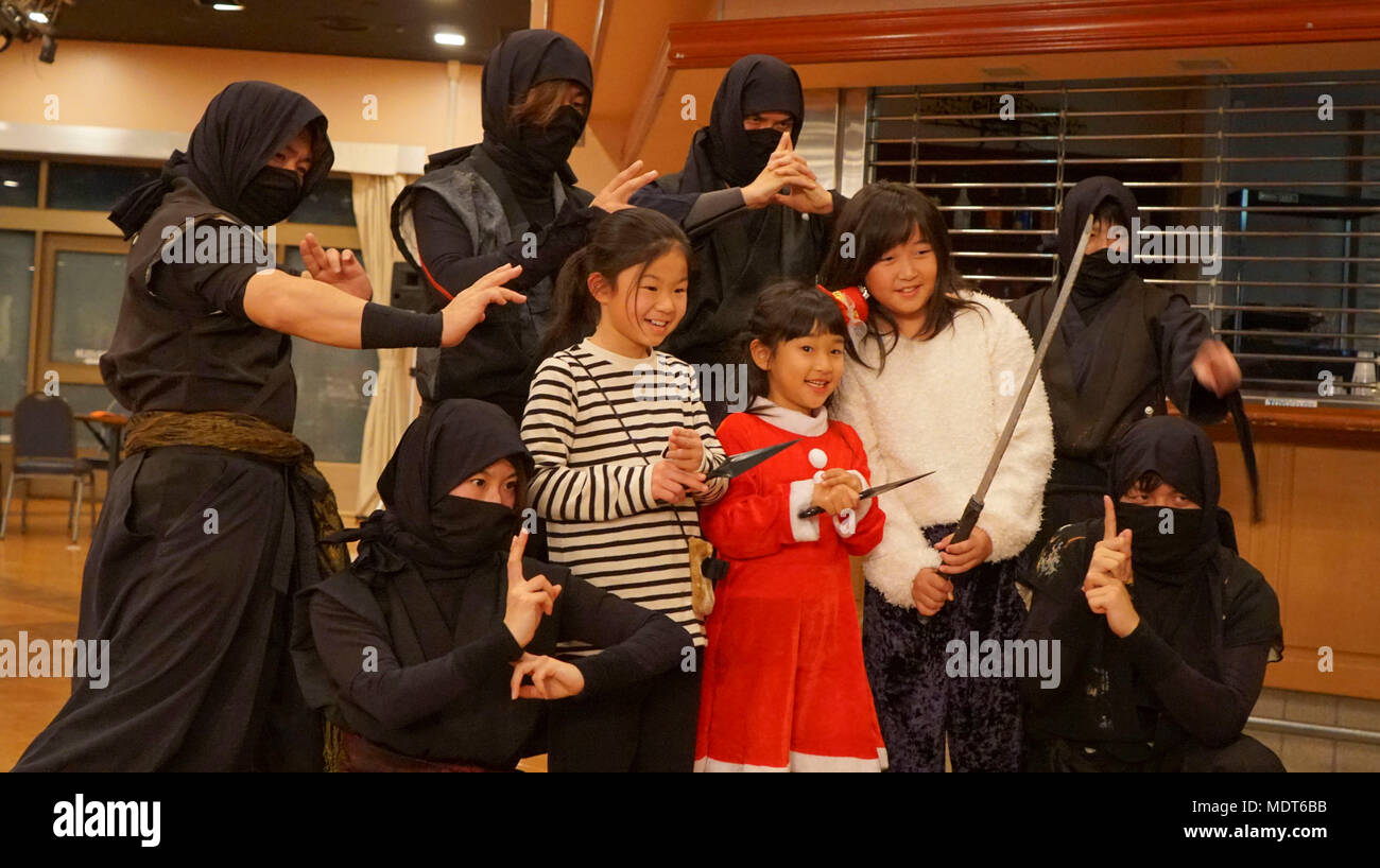 Rasetsu ninja performers from Hiroshima take a photo with kids during ...