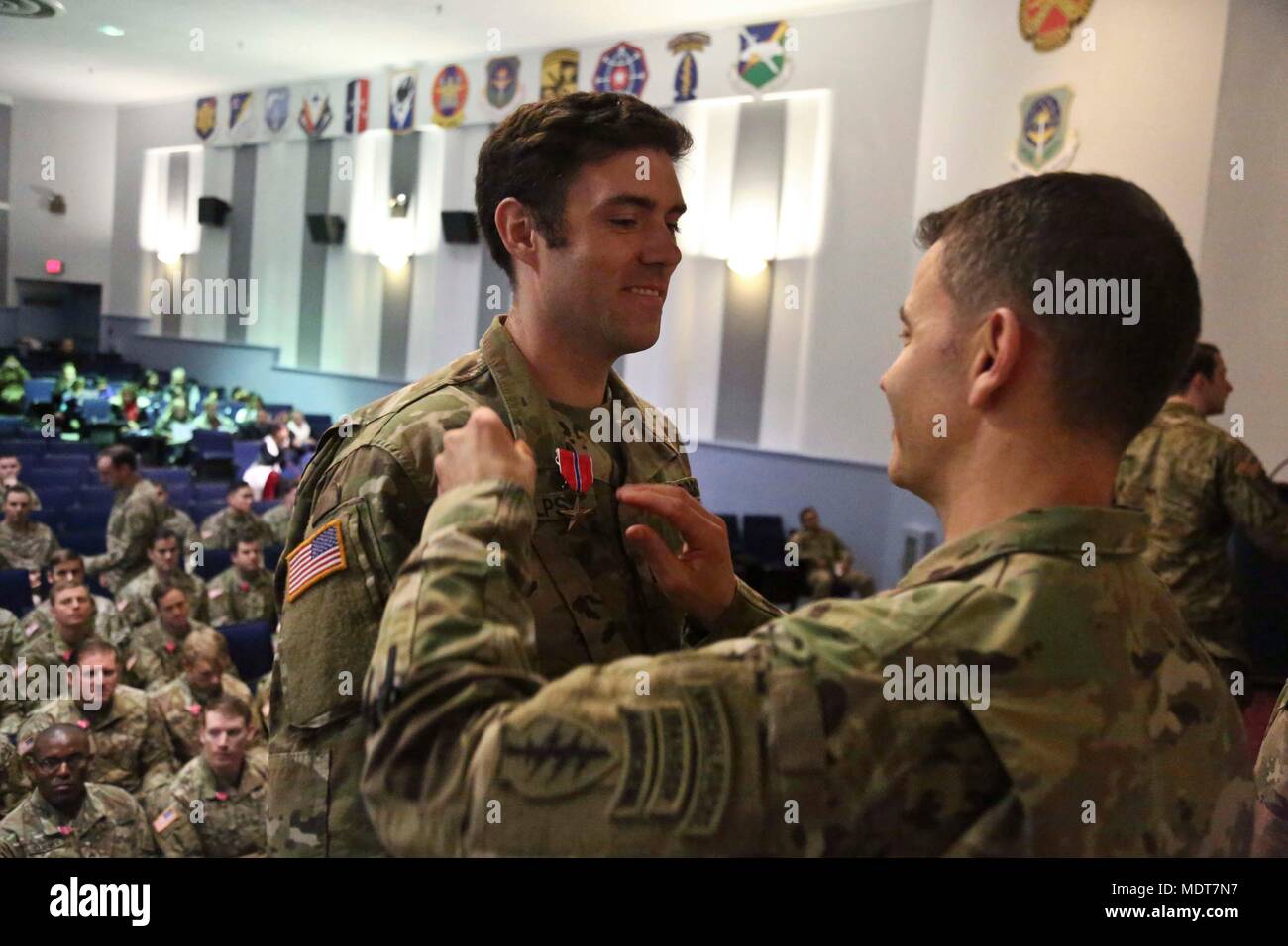 A 1st Special Forces Group (Airborne) Soldier receives a Bronze Star ...