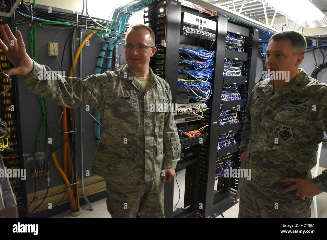 Master Sgt. Matt Hauger, of the 119th Communications Flight, left ...