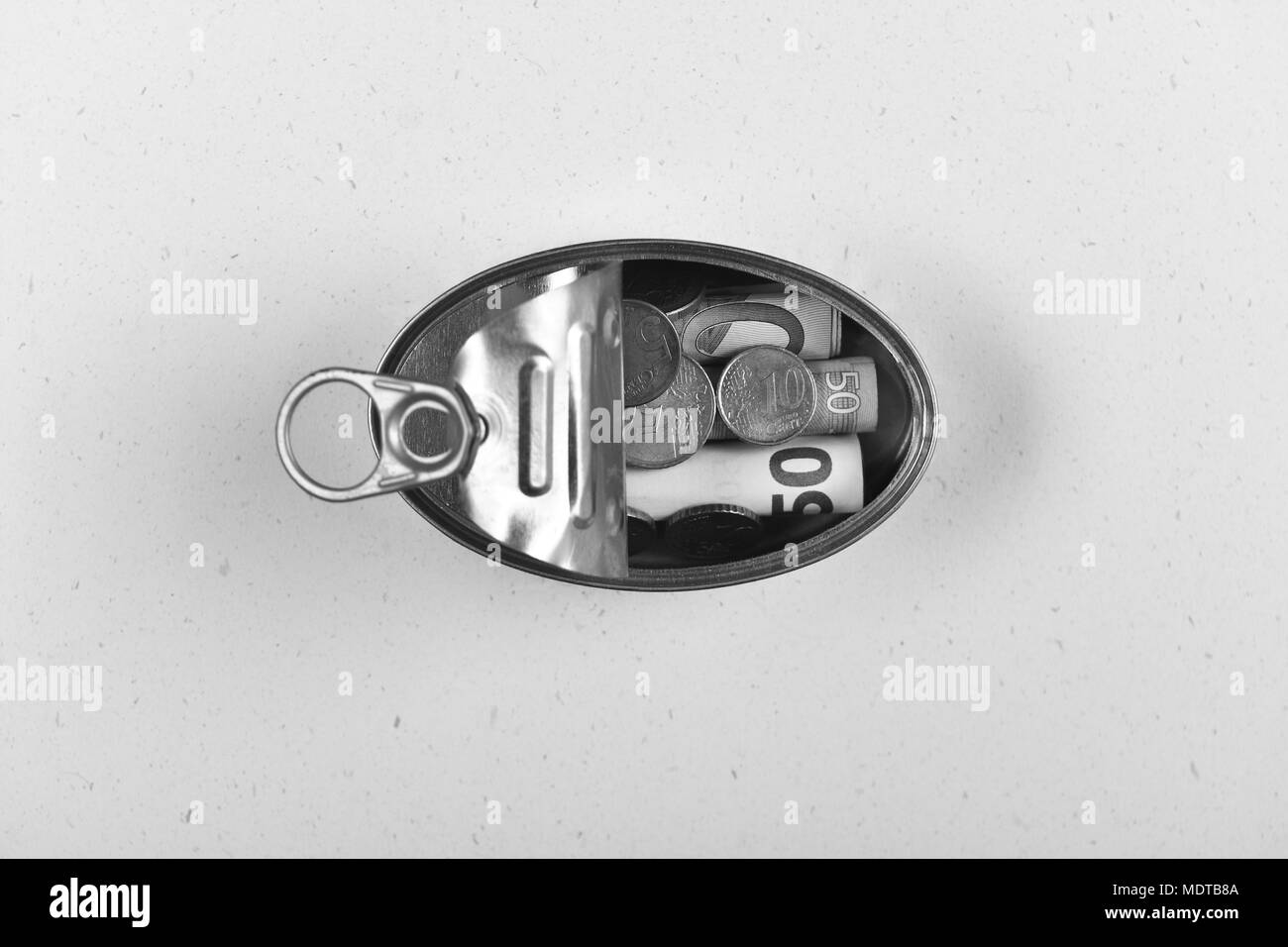 money saved in a can Stock Photo - Alamy