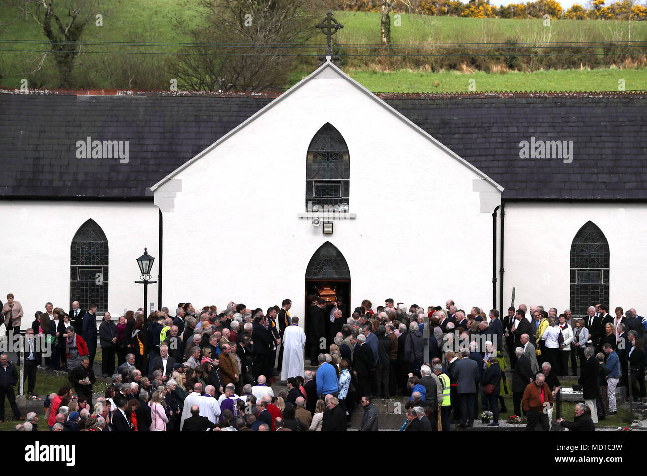 The coffin of Big Tom McBride is taken from Saint Patrick's Church in ...