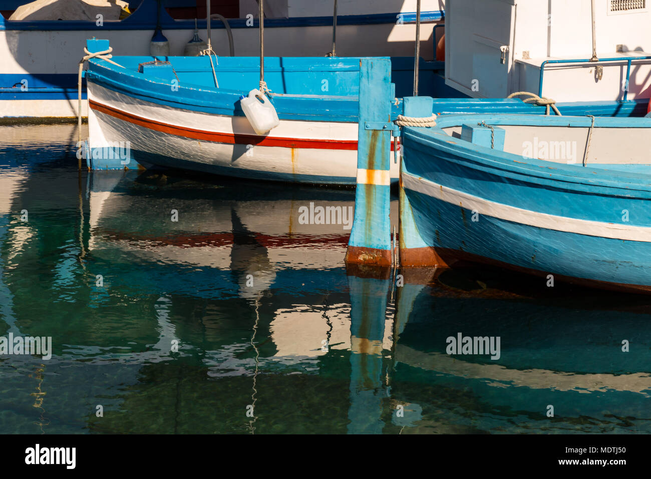 Small traditional fishing boat, made of wood, coloured, painted, Sicily ...