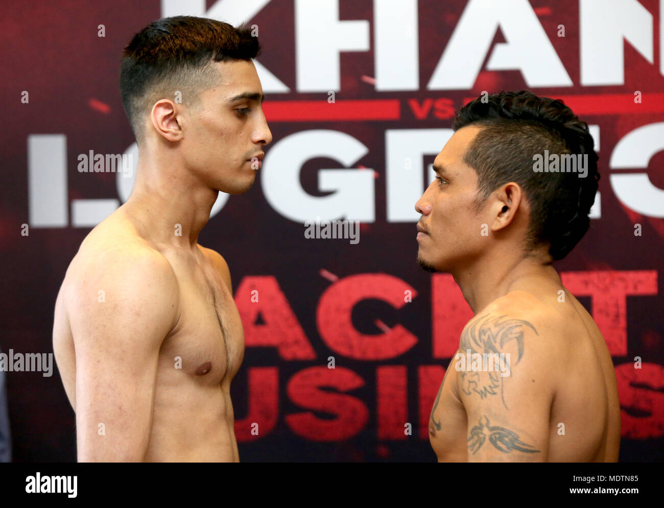 Jose Hernandez (right) and Osman Aslam (left) during the weigh-in at ...