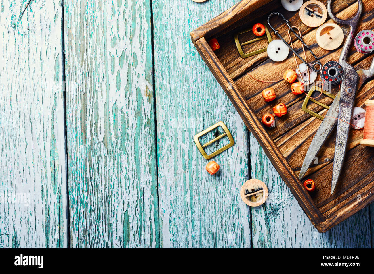 Box with buttons from clothes, threads and scissors.Sewing accessories ...