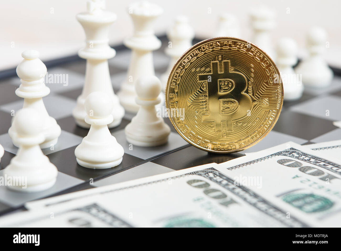 Golden bitcoin coin symbolizes elements of virtual economy or crypto ...