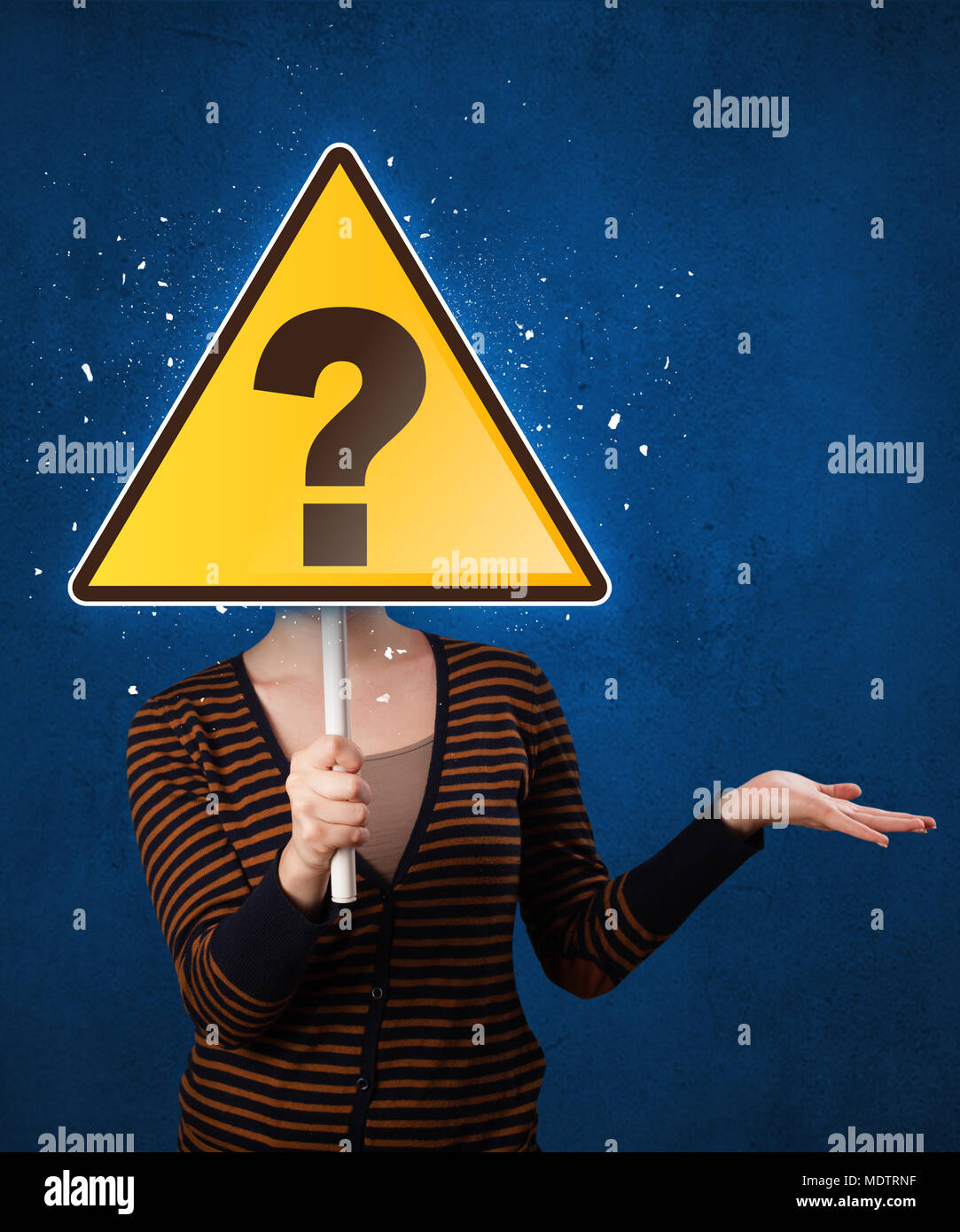 Casual young woman holding yellow sign with question mark Stock Photo ...