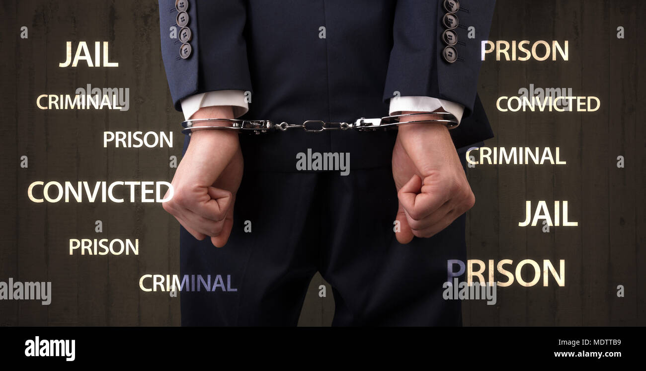 Jail convicted prison criminal labels with close handcuffed man Stock ...