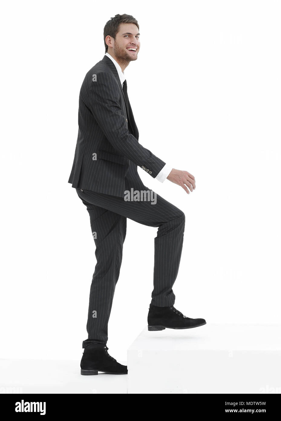 full growth.businessman taking a step forward.isolated on white Stock ...