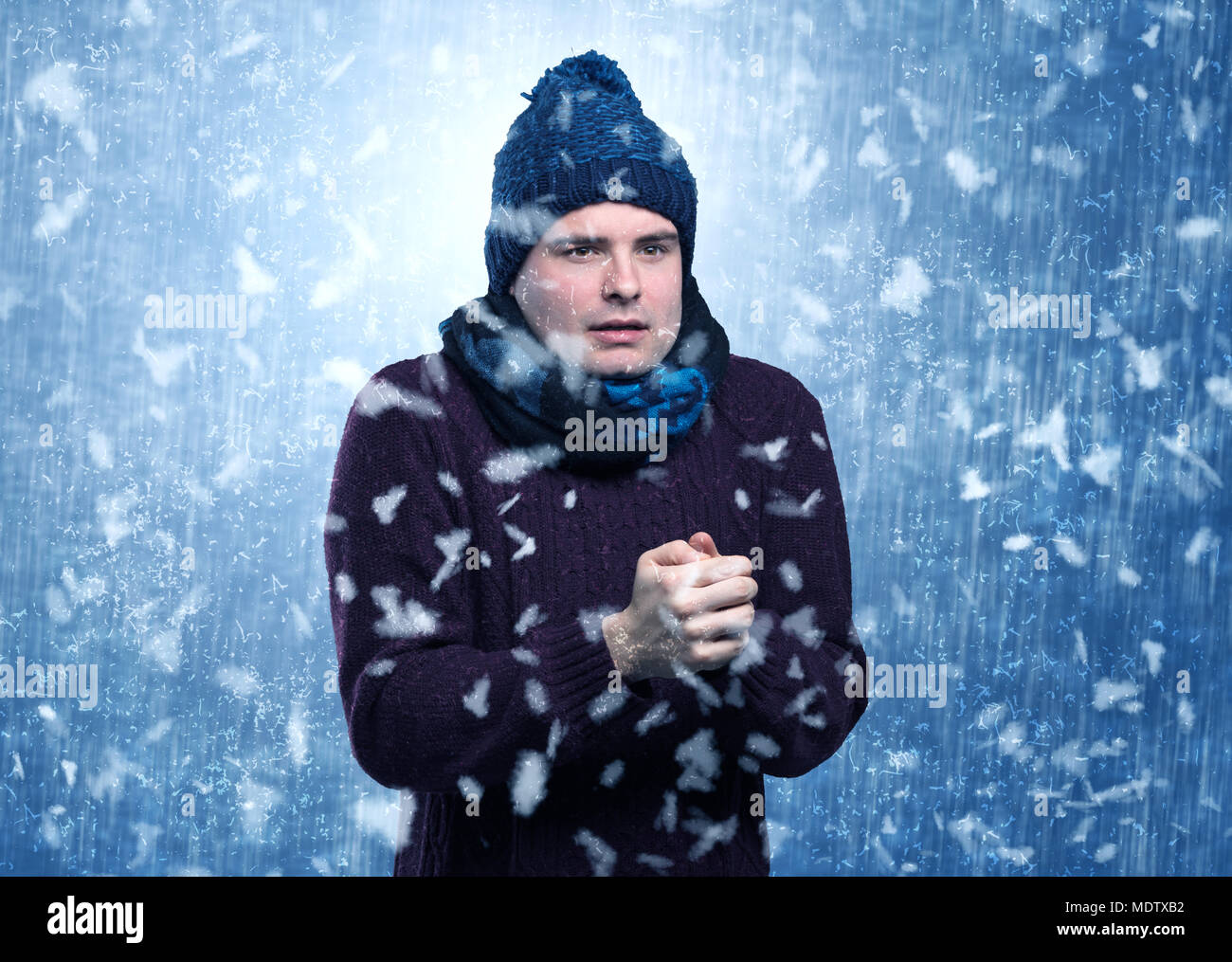 Handsome young boy shivering and trembling at snowstorm concept Stock ...