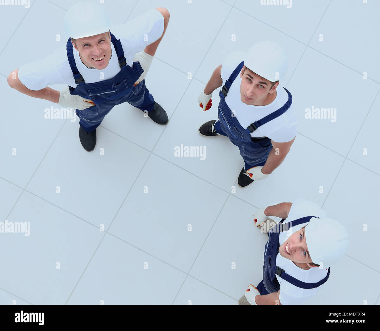 view from the top - group of construction workers Stock Photo - Alamy