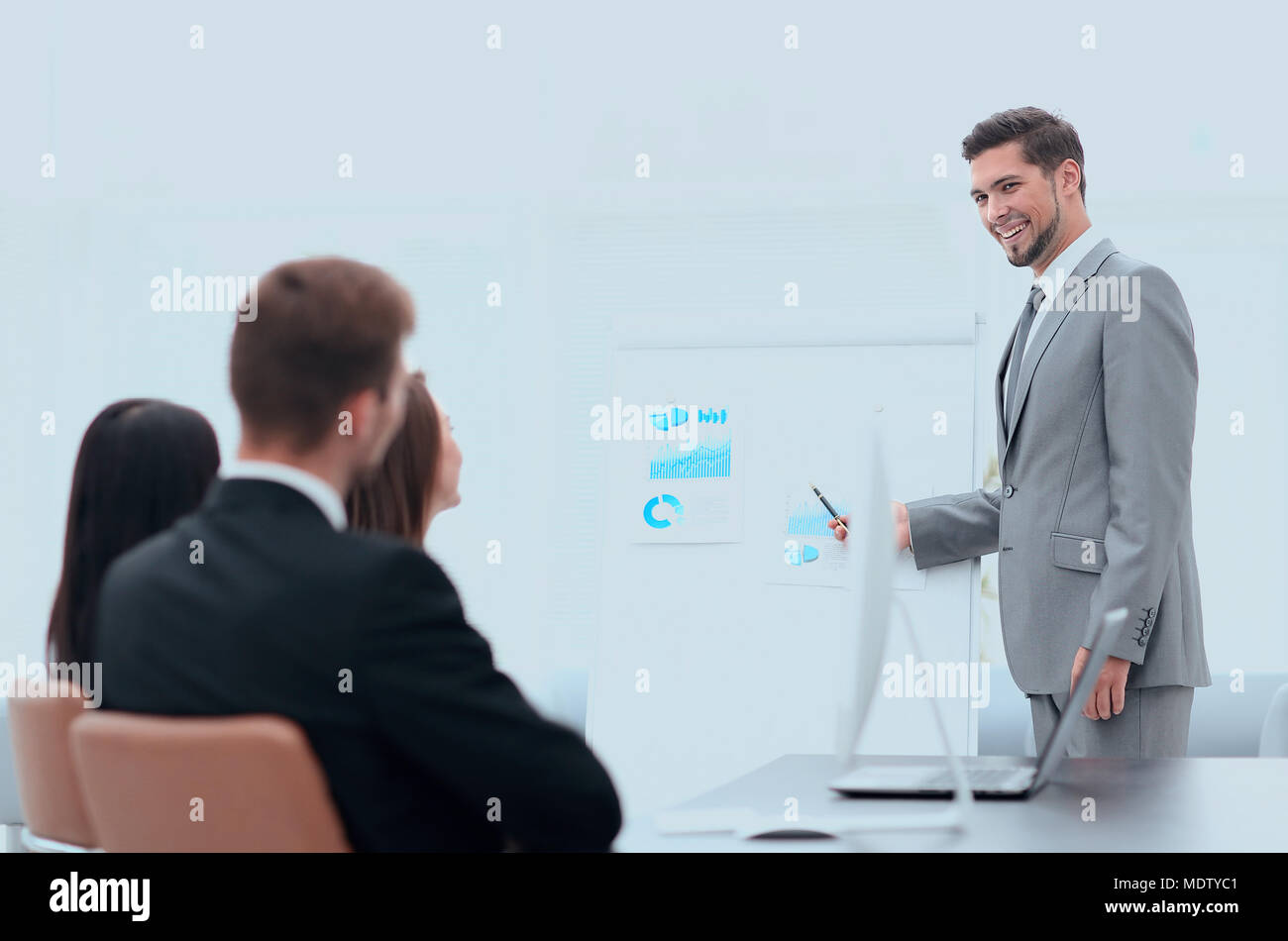 Business man making a presentation in the office Stock Photo - Alamy