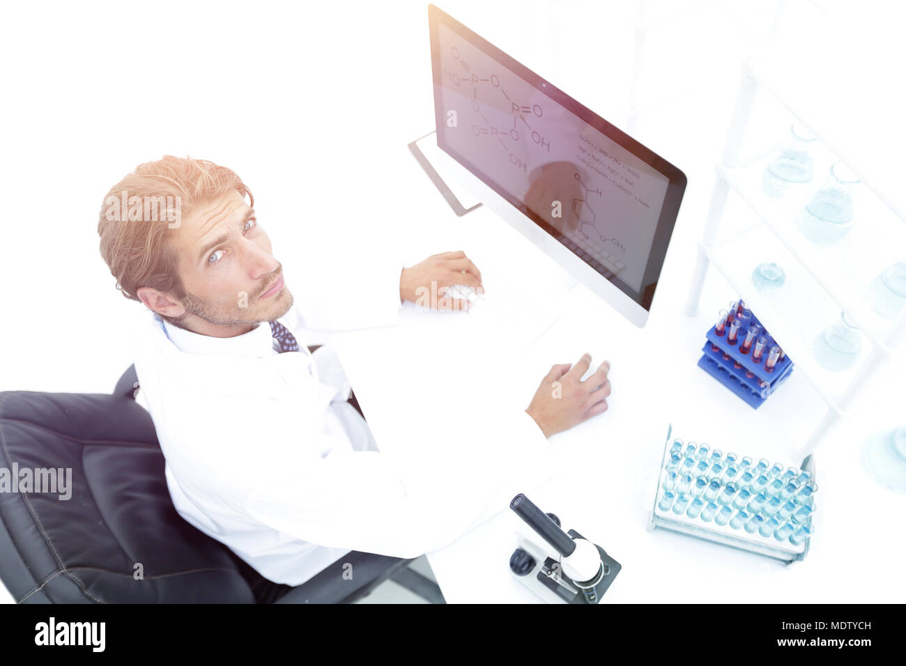 view from above of the scientist-doctor sitting on the computer Stock ...