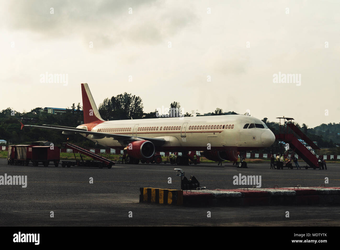 Aircraft on the runway in airport. plane on the runway during landing ...