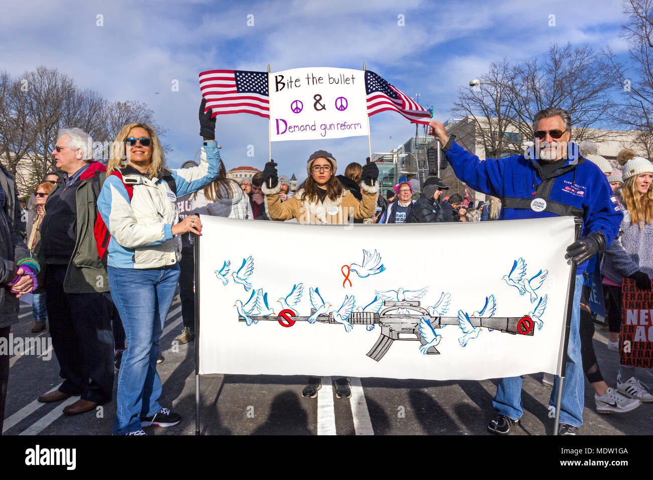 Holding protest signs hi-res stock photography and images - Alamy