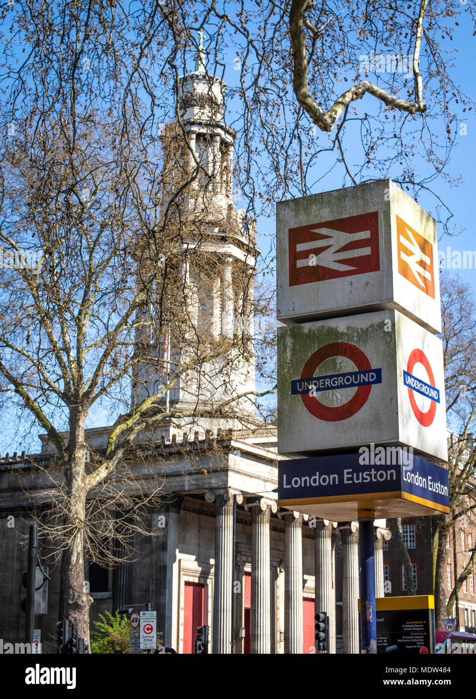 Euston Road rush hour with Euston station railway and underground signs ...