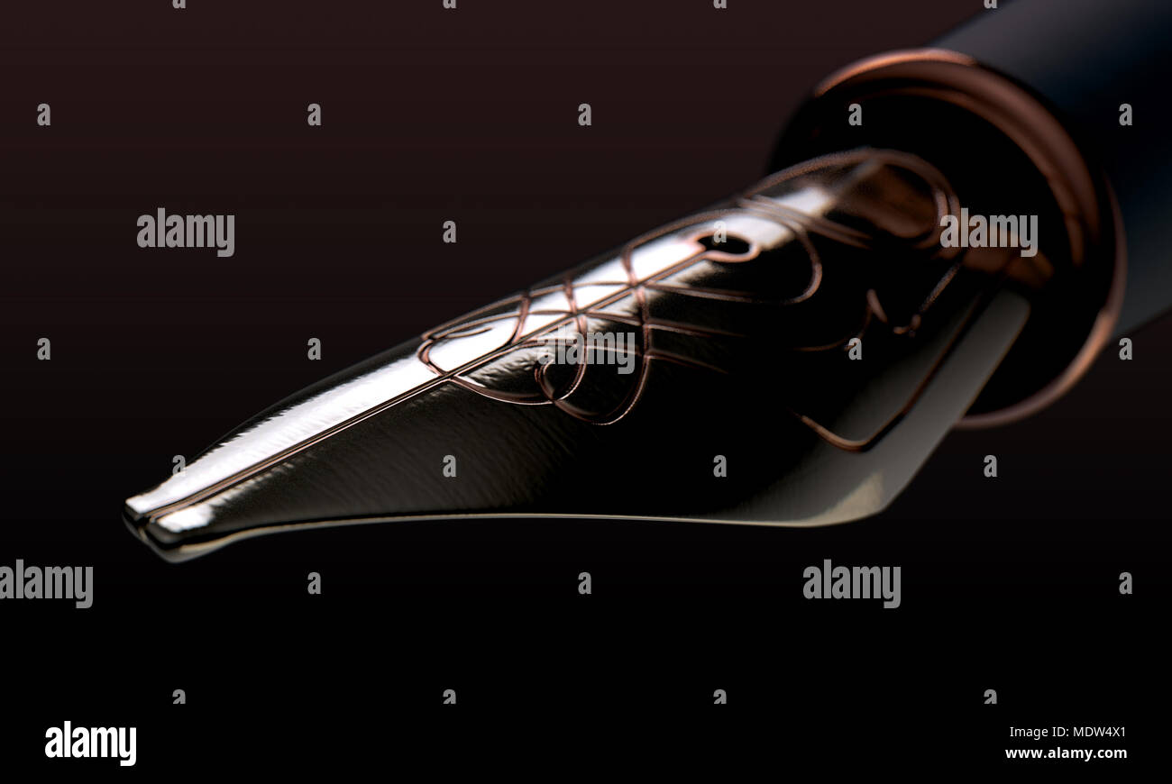 A closeup of the metal nib of an ornate and intricate fountain pen with ...