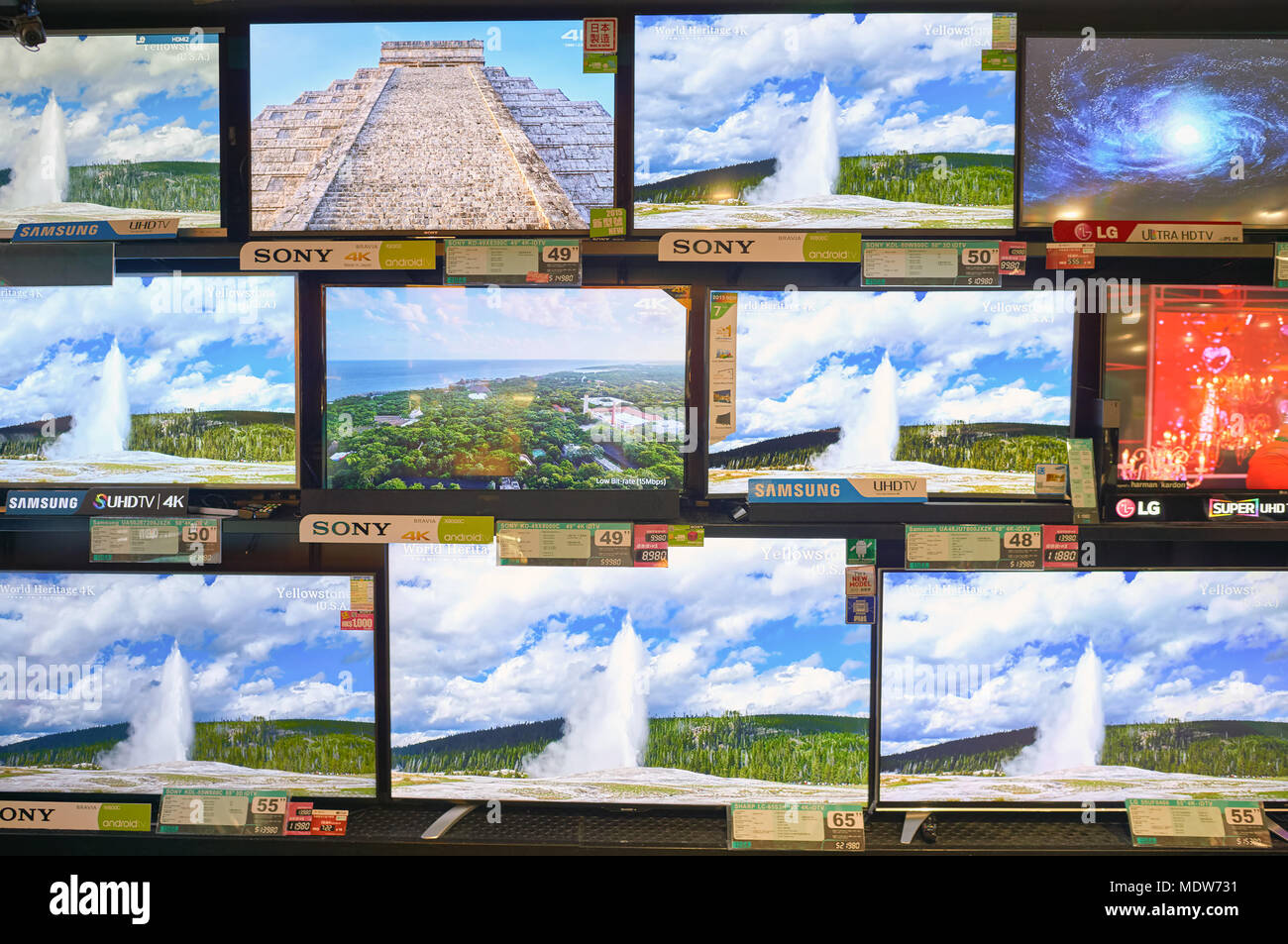 HONG KONG - NOVEMBER 02, 2015: TVs on display at electronics store in ...