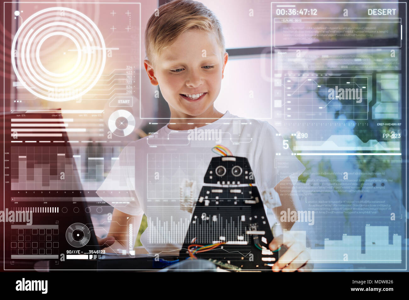 Little optimistic inventor looking at his robot and feeling happy Stock ...